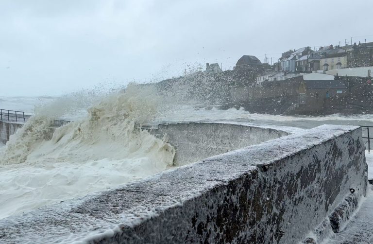 Storm Bram creates huge amounts of sea foam at Porthleven, Cornwall, UK ...